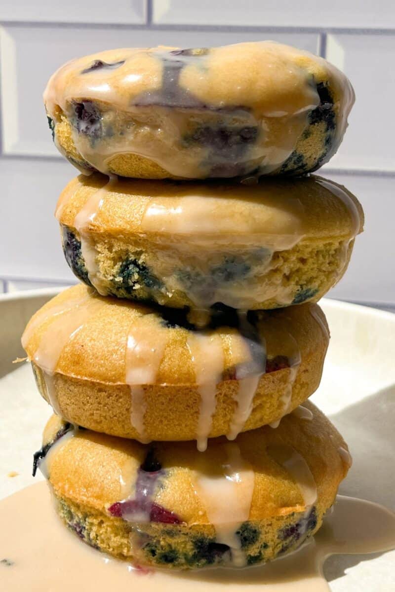 Glazed Blueberry Cake Donuts Recipe - Feasty Travels