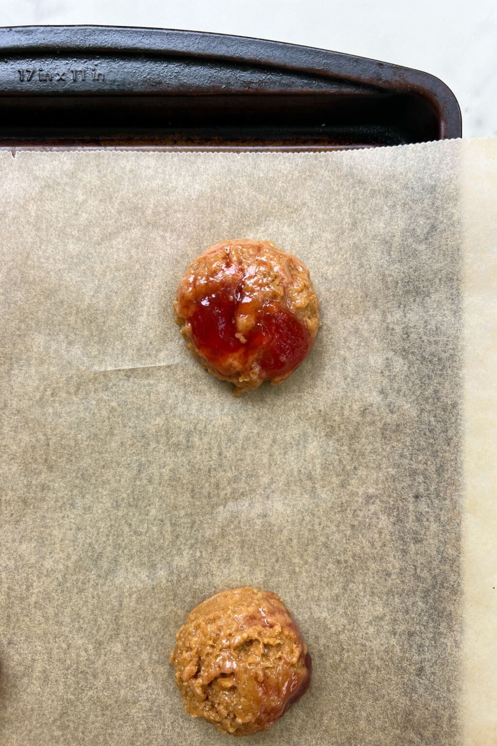 Peanut Butter and Jam Cookies - Feasty Travels