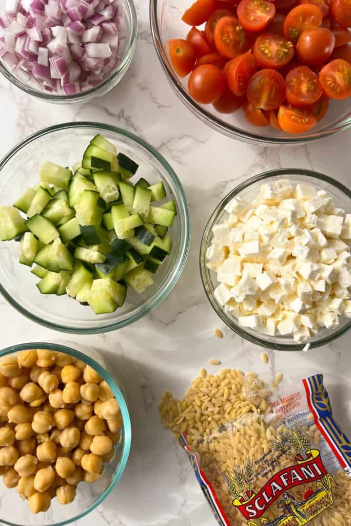 Greek Orzo Pasta Salad with Lemon Dijon Dressing - Feasty Travels
