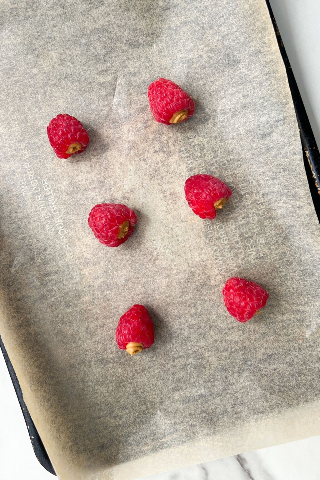 Chocolate Covered Raspberries with Peanut Butter - Feasty Travels