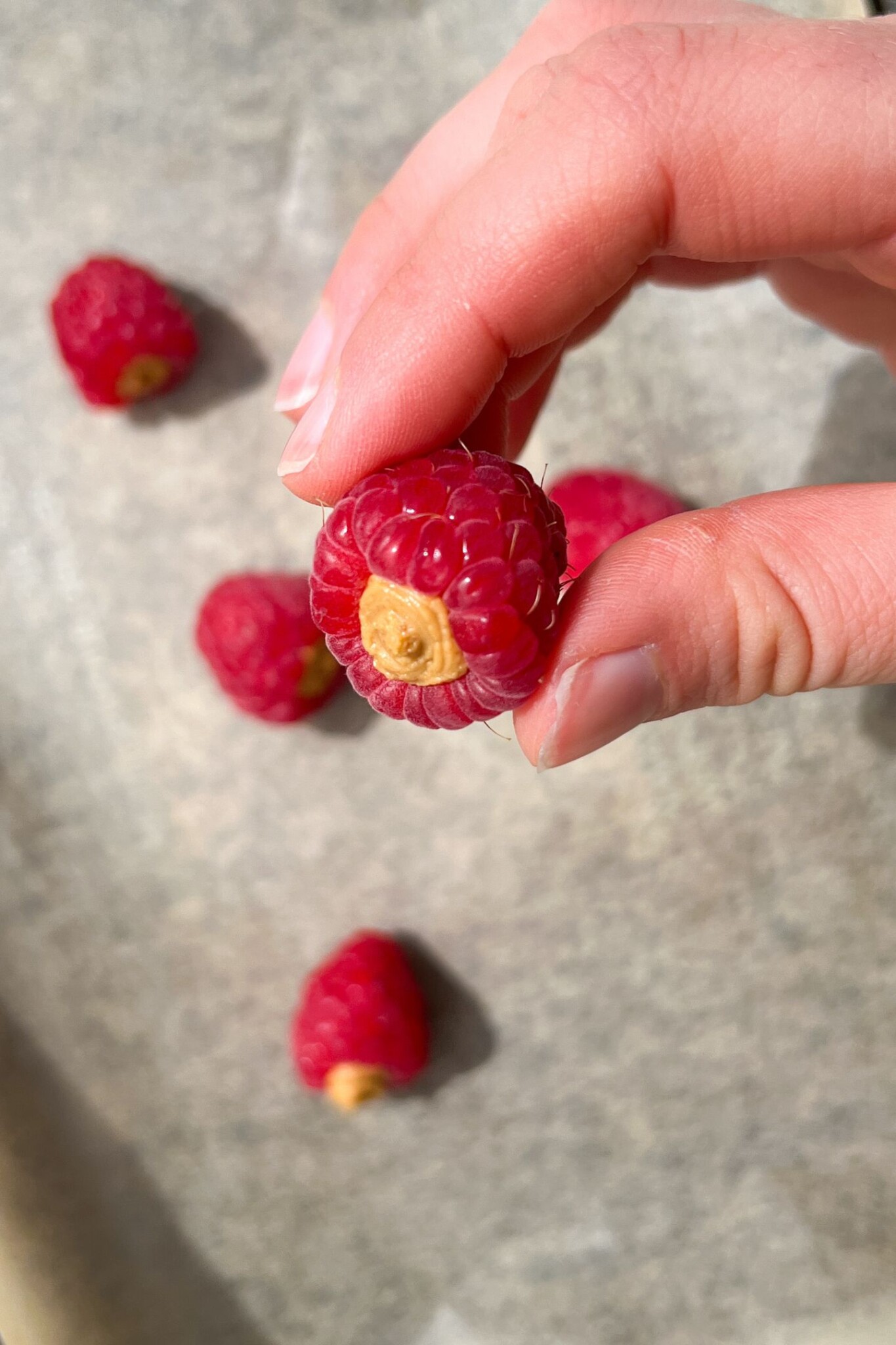 Chocolate Covered Raspberries with Peanut Butter - Feasty Travels