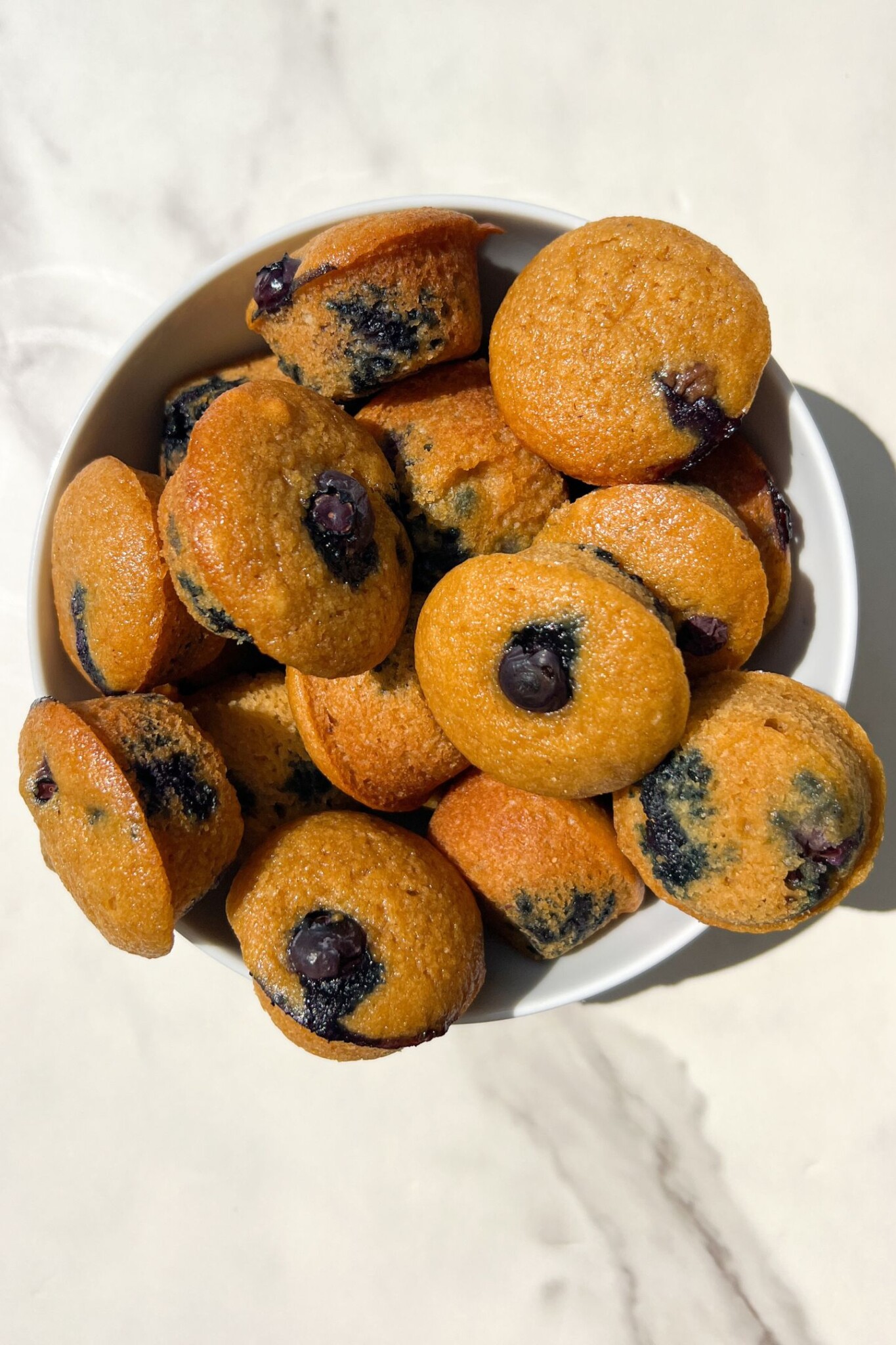 Mini Blueberry Muffins Recipe - Feasty Travels