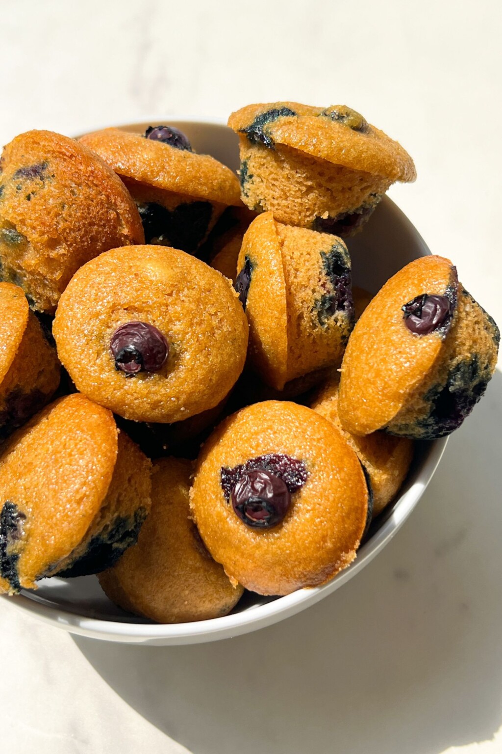 Mini Blueberry Muffins Recipe - Feasty Travels