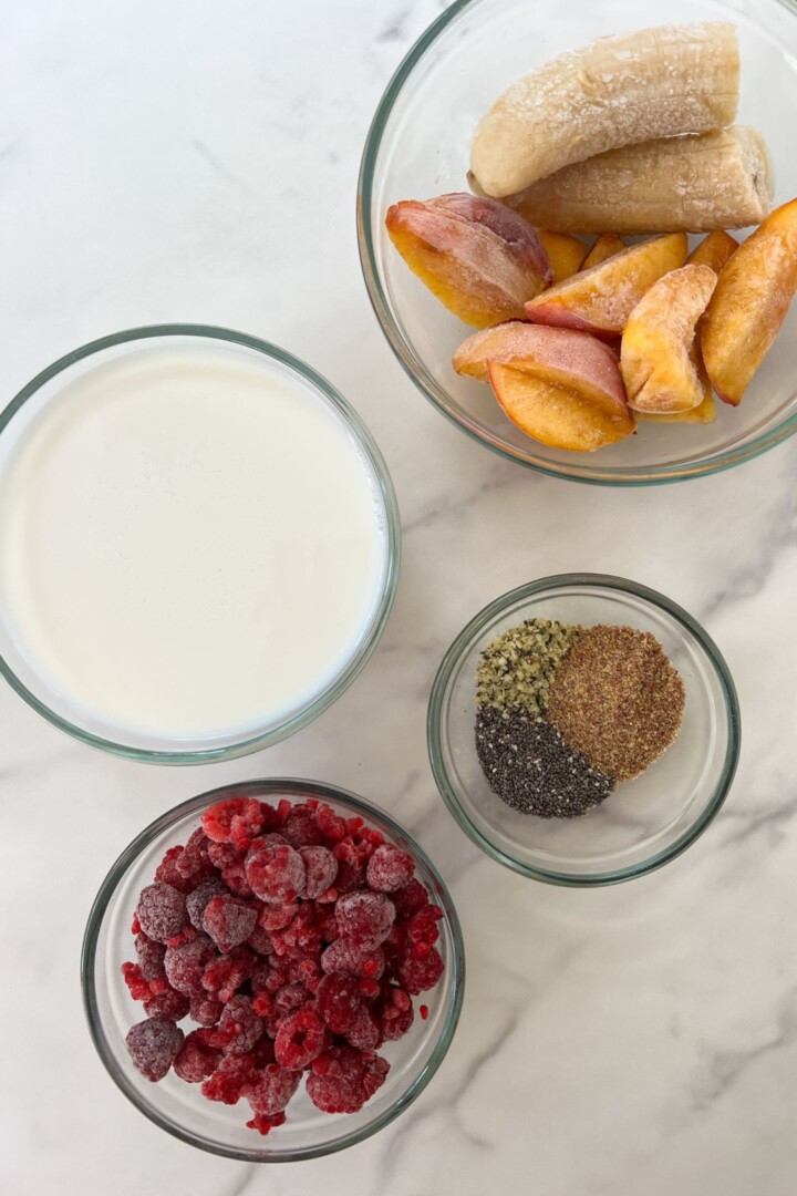 Raspberry Smoothie with Frozen Fruit - Feasty Travels