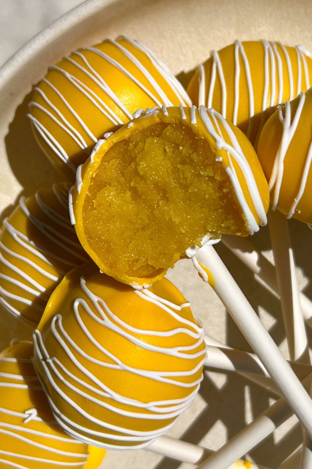 Lemon Cake Pops Recipe - Feasty Travels